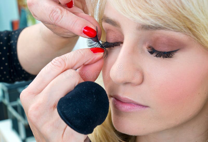 Applying Artificial Eyelashes Stock Photo - Image of action, artificial ...