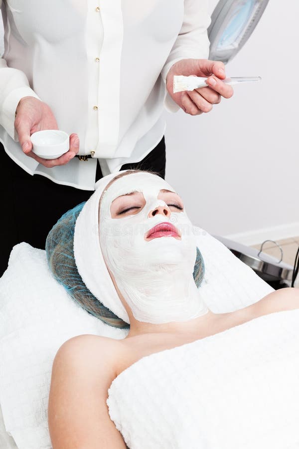 Applying cosmetic mask stock image. Image of beauty, healthcare - 69216429