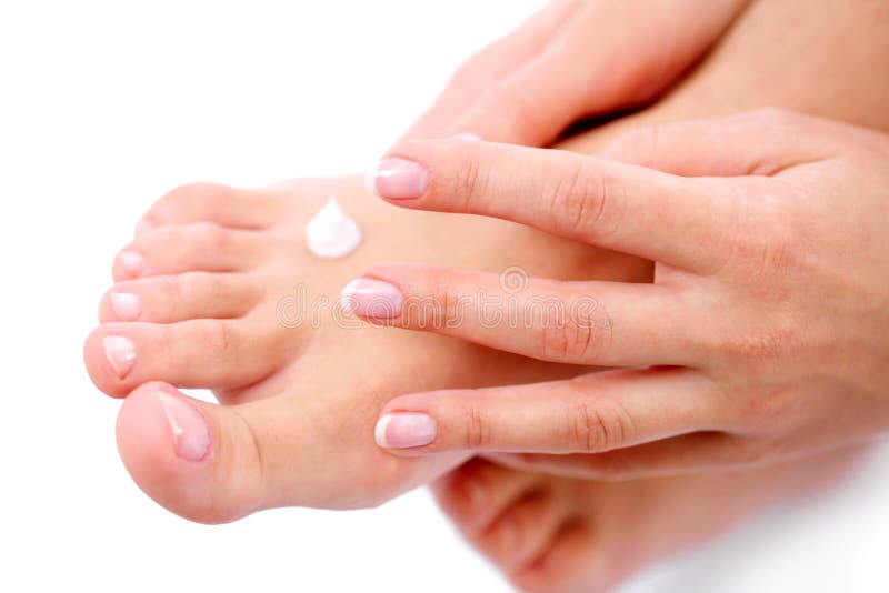 Applying cream on foot stock photo. Image of apply, applying - 13228628