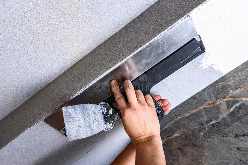 Applying Decorative Mosaic Stone Plaster on Ceiling. Stock Photo ...