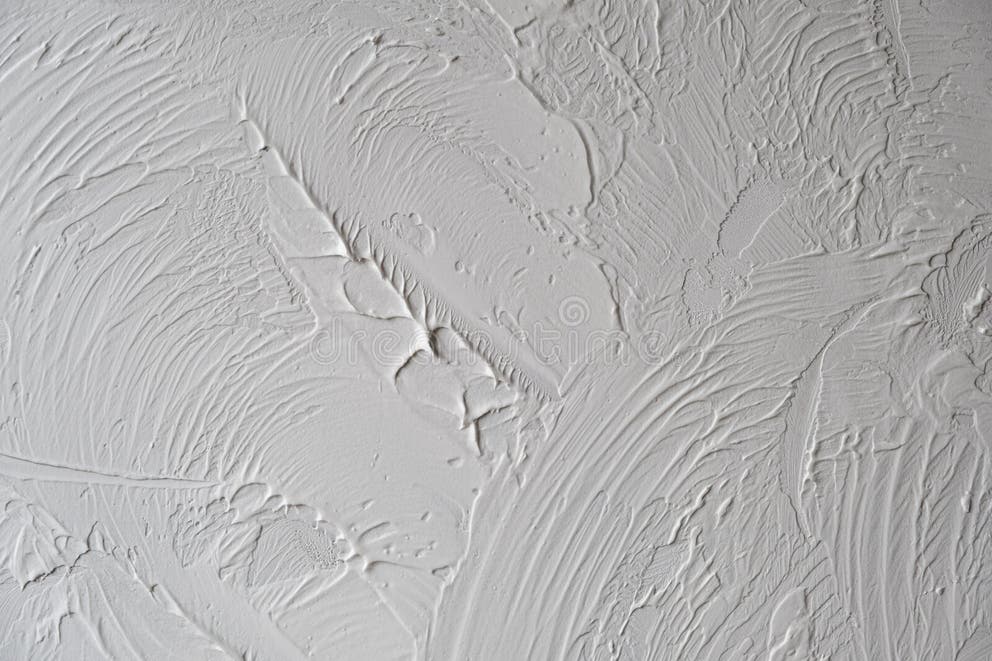 Applying Decorative Putty. White Abstract Texture of Surface Covered ...