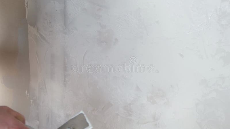 Applying Decorative Putty. White Abstract Texture of Surface Covered ...