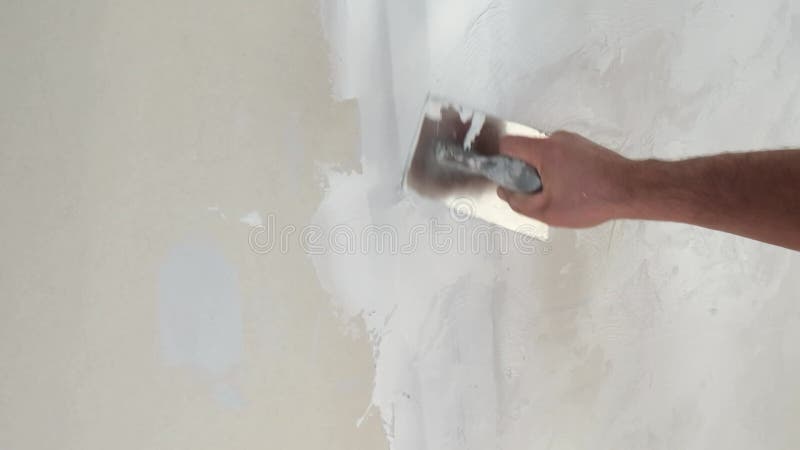 Applying Decorative Putty. White Abstract Texture of Surface Covered ...