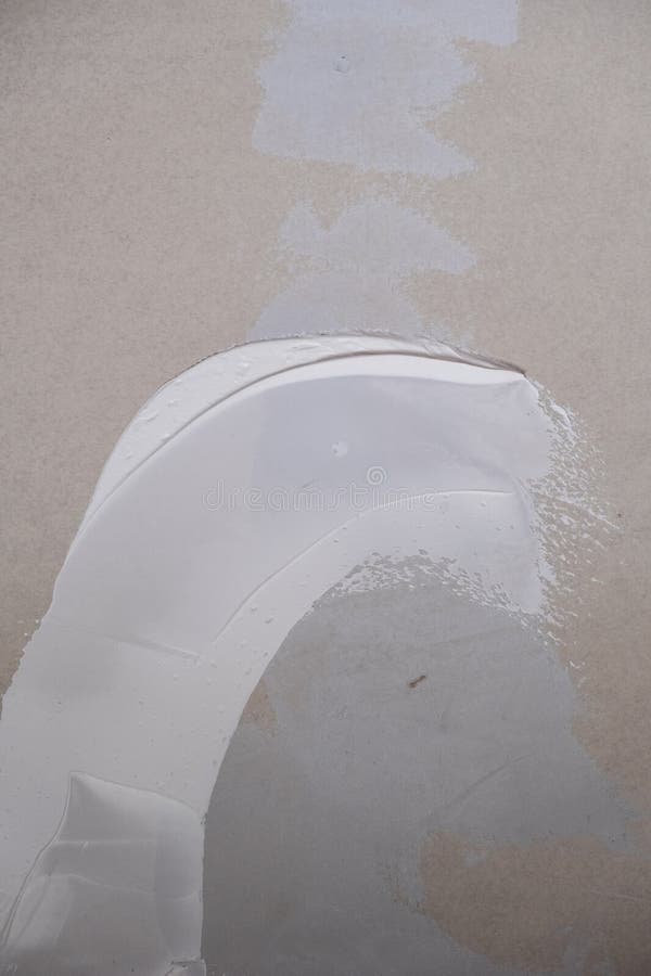 Applying Decorative Putty. White Abstract Texture of Surface Covered ...