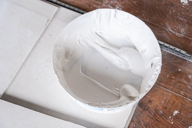 Applying Decorative Putty. White Abstract Texture of Surface Covered ...