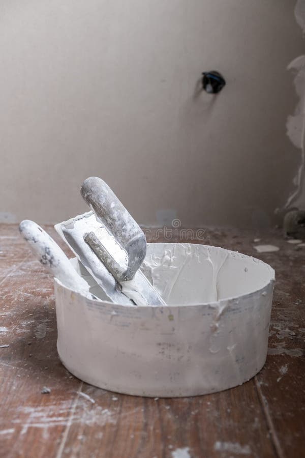 Applying Decorative Putty. White Abstract Texture of Surface Covered ...