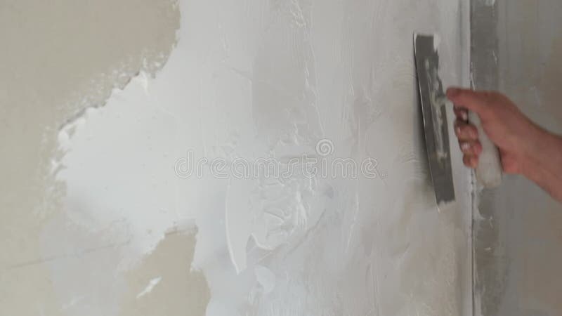 Applying Decorative Putty. White Abstract Texture of Surface Covered ...
