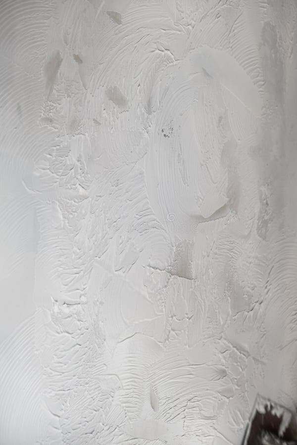 Applying Decorative Putty. White Abstract Texture of Surface Covered ...