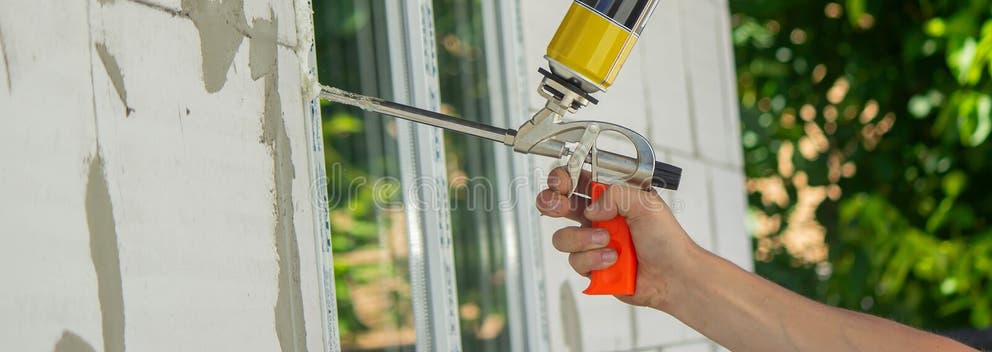 Applying Expanding Foam for Window Installation Stock Photo - Image of ...