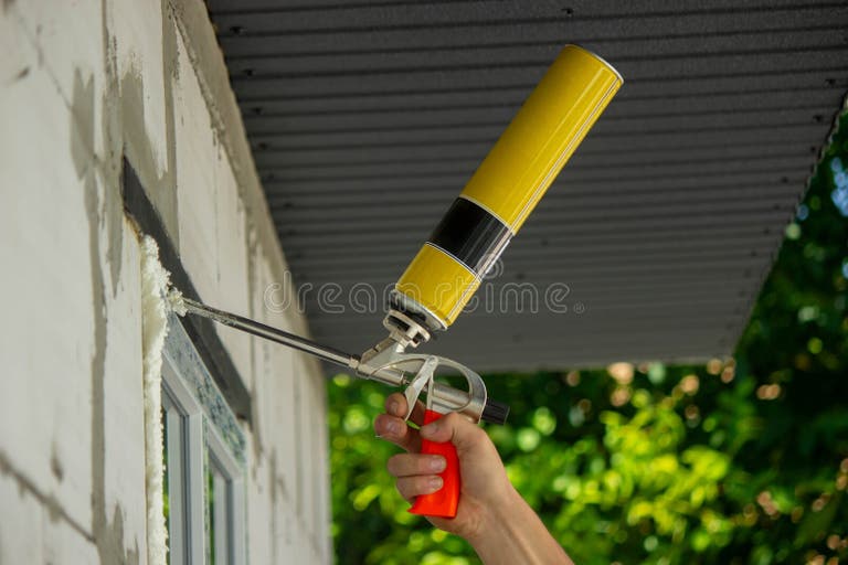Applying Expanding Foam for Window Installation Stock Photo - Image of ...