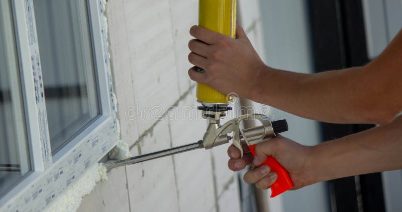 Applying Expanding Foam for Window Installation Stock Photo - Image of ...