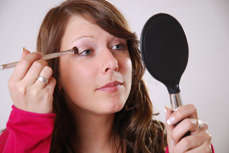 Applying eye shadow stock photo. Image of brunette, brushing - 14287808