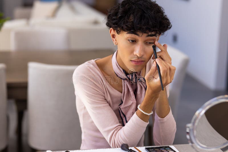Applying Eyeliner, Transgender Transgender Woman Using Makeup Brush in ...