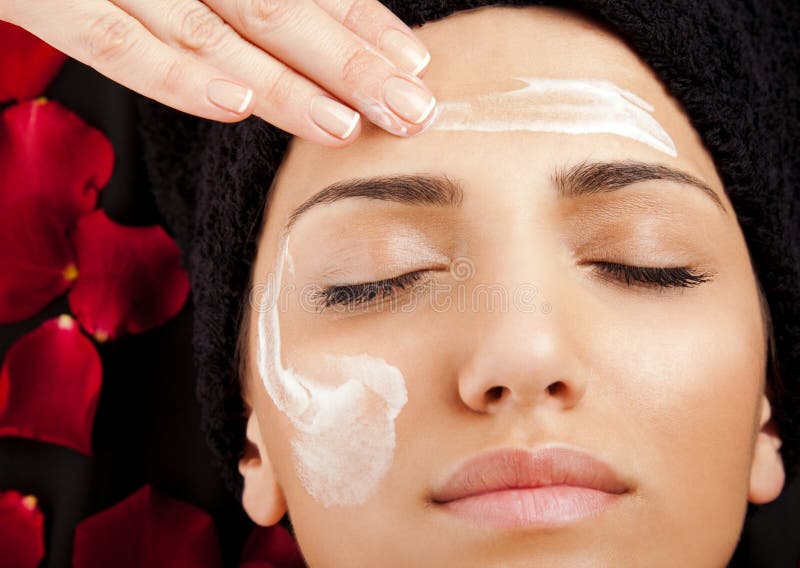 Applying face cream stock image. Image of therapy, skin - 13450899