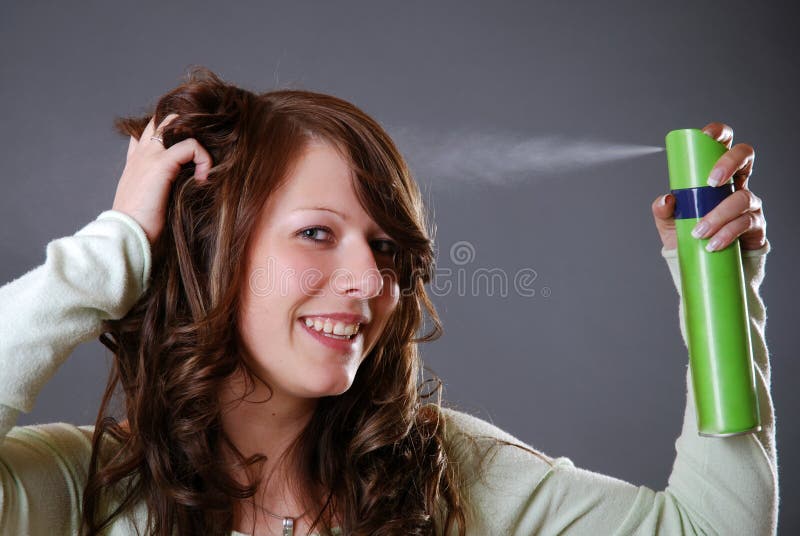 Applying hairspray stock photo. Image of hair, smiles - 15868750