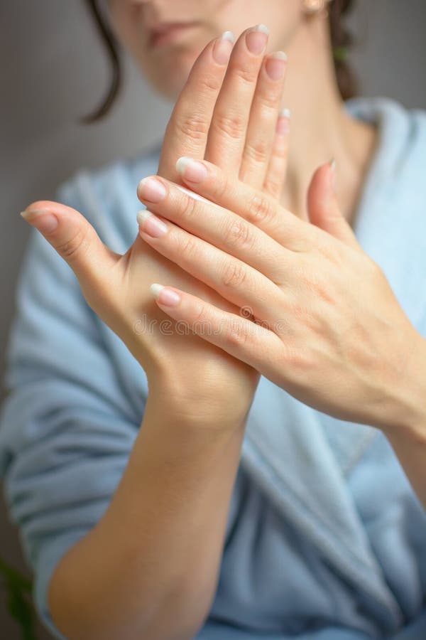 Applying hand cream stock photo. Image of hygiene, cosmetic - 134665020