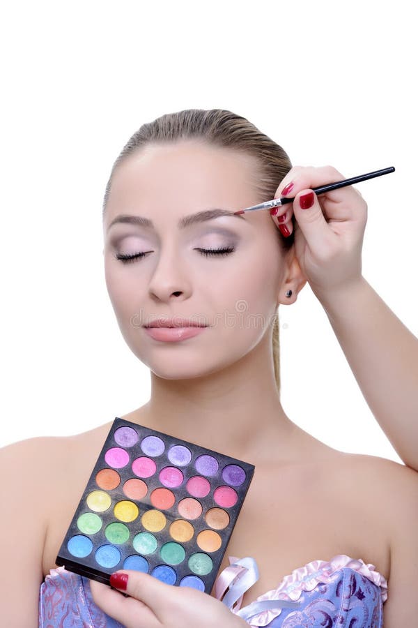 Applying make-up stock photo. Image of pretty, holding - 22516708