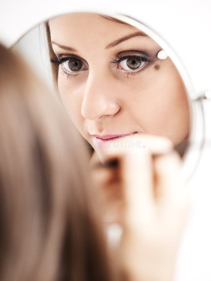 Applying make-up stock photo. Image of reflection, attractive - 61089848