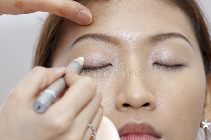 Applying makeup stock image. Image of closed, candid - 15512967