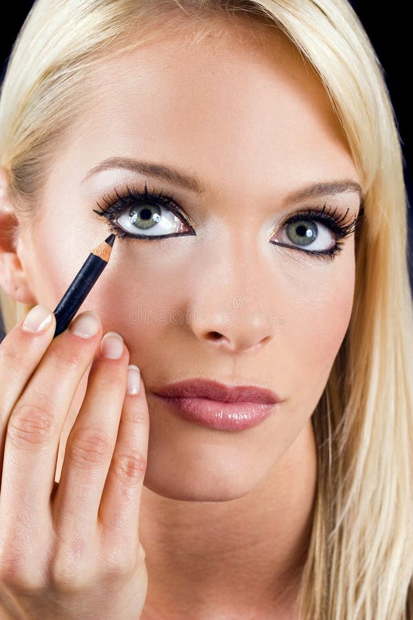 Applying makeup stock photo. Image of clean, beautify - 9329648