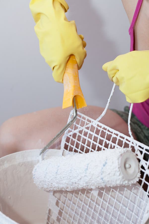 Applying Paint on a Paint Roller Stock Image - Image of painting ...