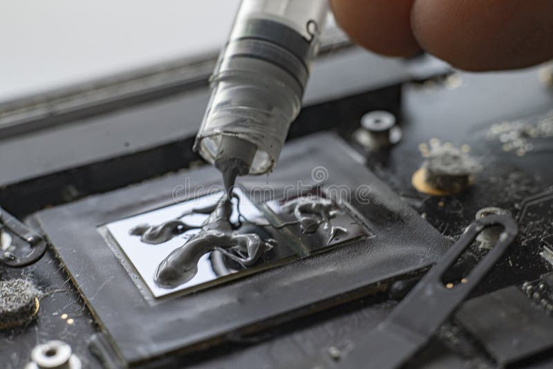 A Applying the Thermal Grease To the Gpu Chip for Better Heat ...