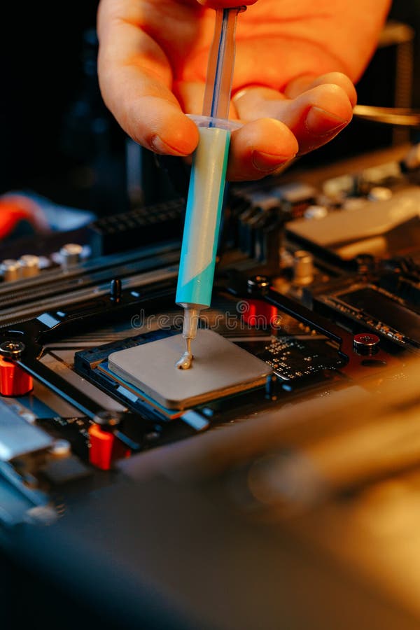 Applying Thermal Paste To a Computer Processor Close Up Stock Image ...