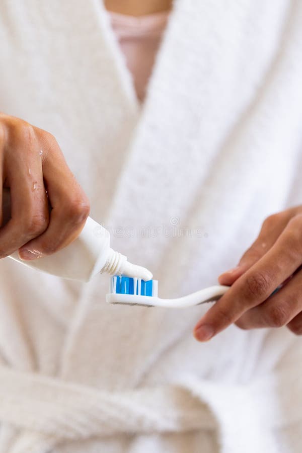 Applying Toothpaste on Toothbrush, Young Man in Bathrobe Preparing for ...