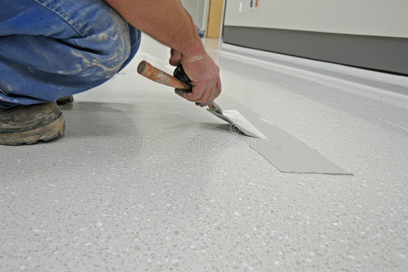 Applying Waterproofing To the Bathroom Floor in a Newly Constructed ...
