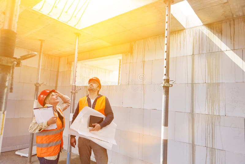 Appraisers Check the Shell of the House on the Construction Site Stock ...