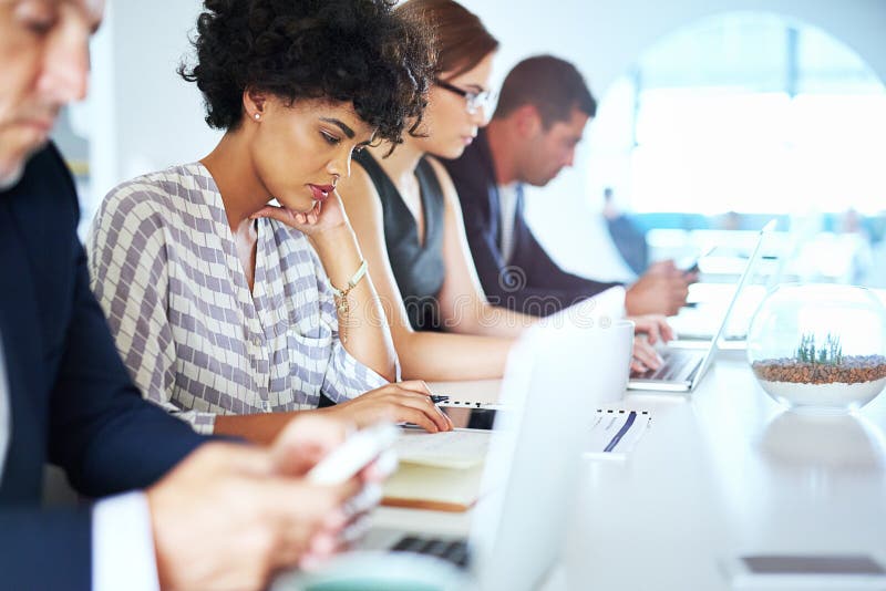 They Appreciate the Value of Hard Work. Colleagues Working at a Desk in ...