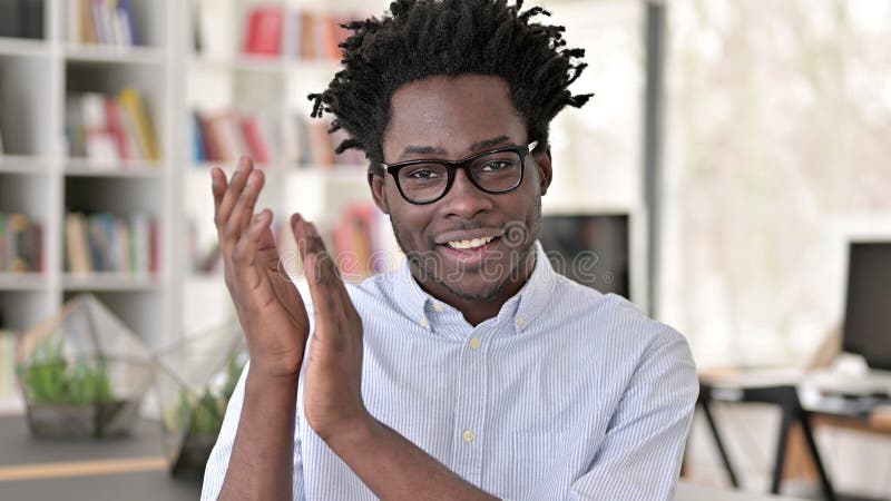 Appreciative Young African Man Clapping Stock Photo - Image of business ...