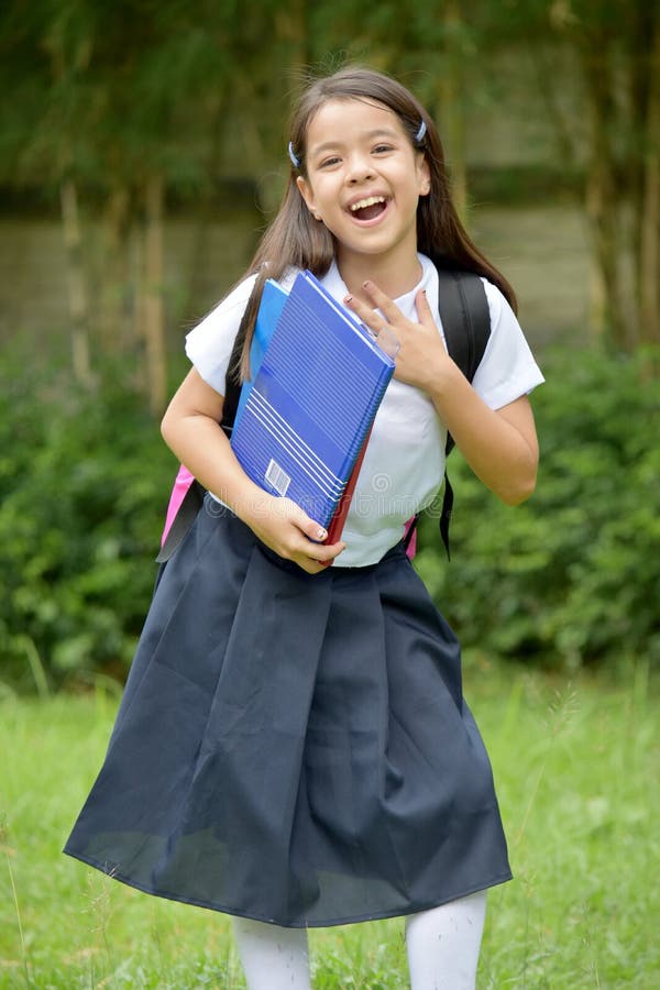 Appreciative Child Girl Student with Notebooks Stock Photo - Image of ...