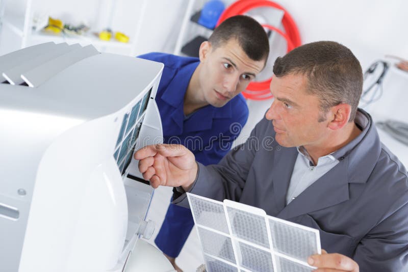 Apprentice Air Conditioning Repairman Stock Image - Image of instructor, efficiency: 8683079