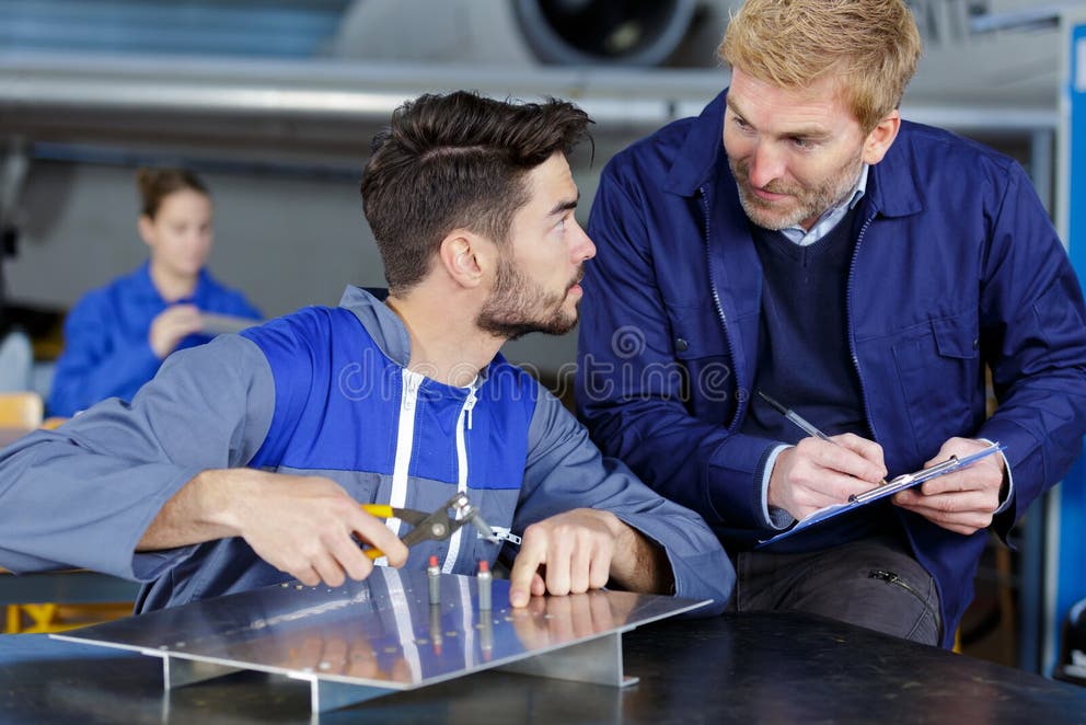 Apprentice Aerospace Engineer Asking Tutor Question Stock Photo - Image ...