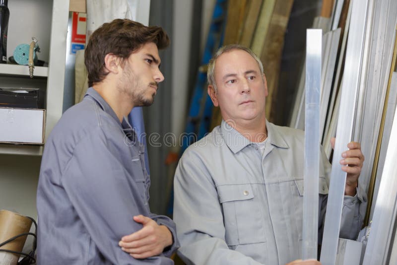 Apprentice Checking Stock Levels in Store Room Stock Photo - Image of ...