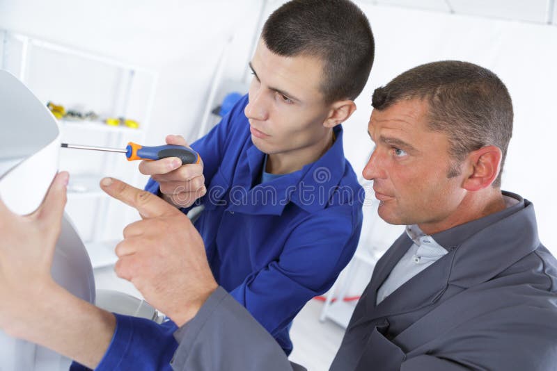 Man Fixing Something on Ceiling Stock Image - Image of hand, beautiful ...