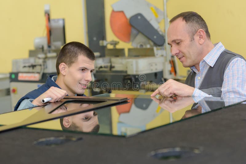 Apprentice Glazier in Factory with Training Supervisor Stock Image ...