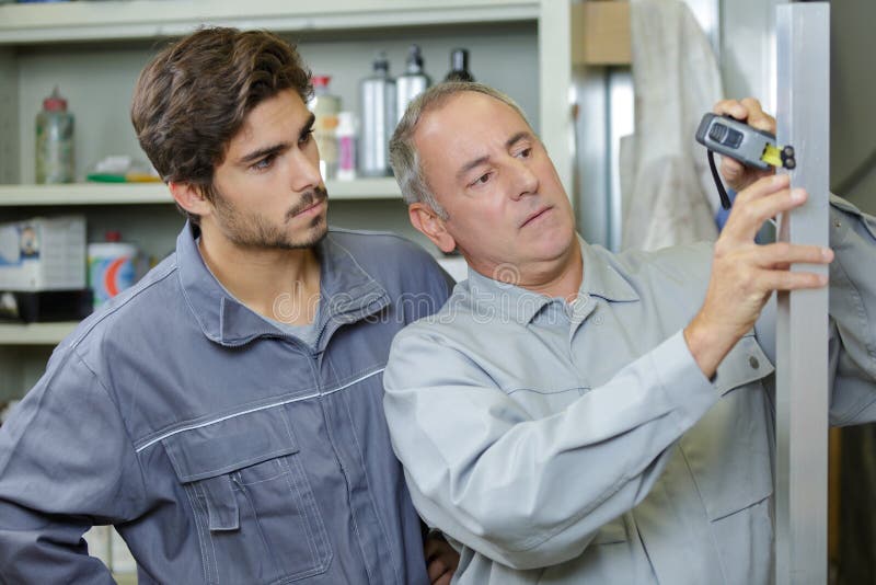 Apprentice with New Boss on First Day Stock Photo - Image of helmets ...