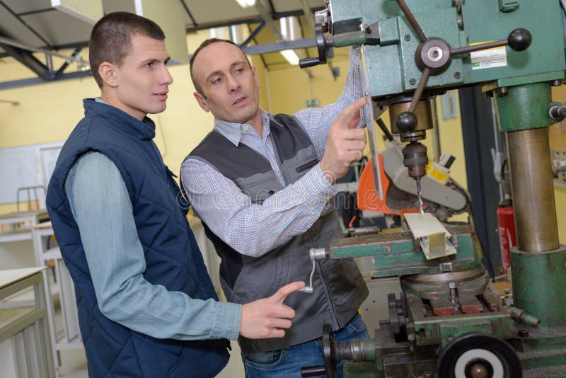 Apprentice on Machine Operation Stock Photo - Image of apprentice ...