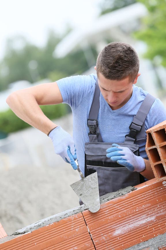 Apprentice of Masonry Laying Bricks Stock Image - Image of training ...