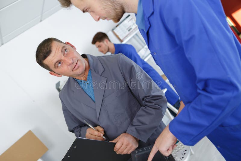 Apprentice Mechanic in Auto Repair School Stock Photo - Image of shop ...