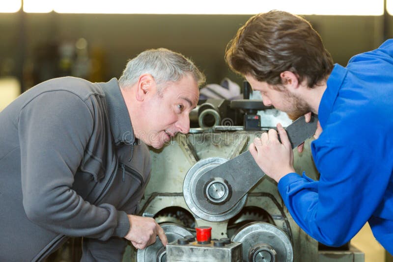 Apprentice Mending Lathe Machine Stock Photo - Image of iron ...