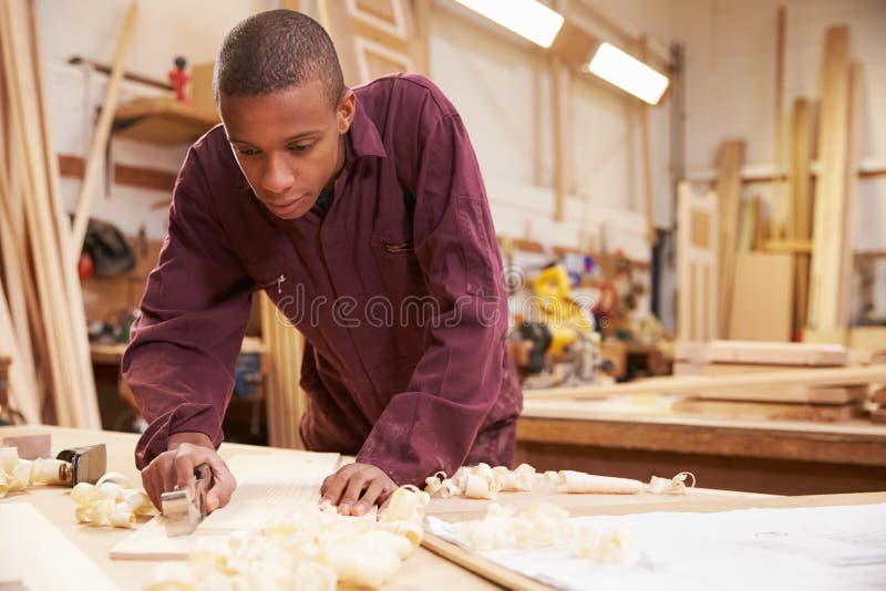 Apprentice Using Circular Saw in Carpentry Workshop Stock Image - Image ...