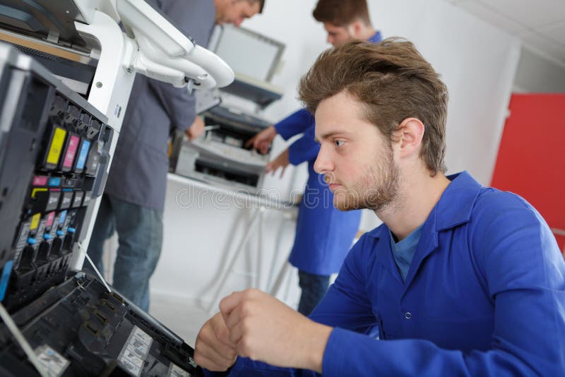 Apprentice Repairing Printer at Class Stock Image - Image of chip ...