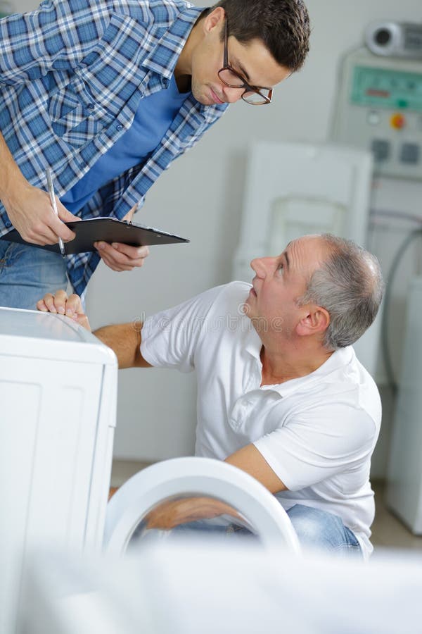 Apprentice Repairman Learning with Instructor Stock Image - Image of ...