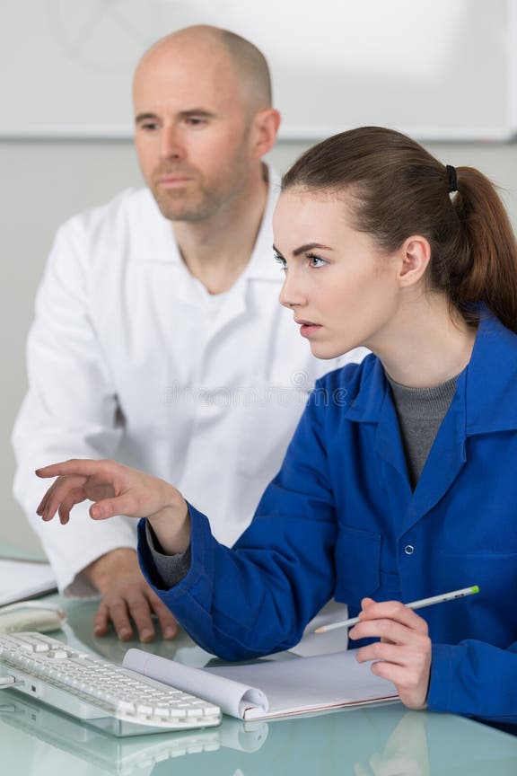 Apprentice Taking Some Notes Stock Photo - Image of laborer, manual ...