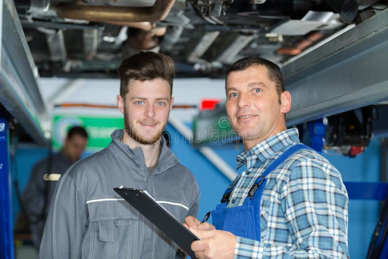 Apprentice and Teacher Smiling Stock Photo - Image of apprenticeship ...