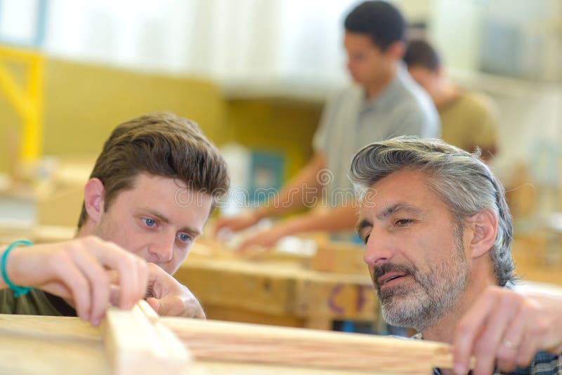 Apprentice- Teacher - Woodwork Class Stock Image - Image of occupation ...