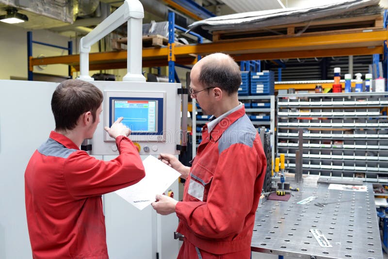 Trainer and Apprentice in Technical Vocational Training at a Drilling ...
